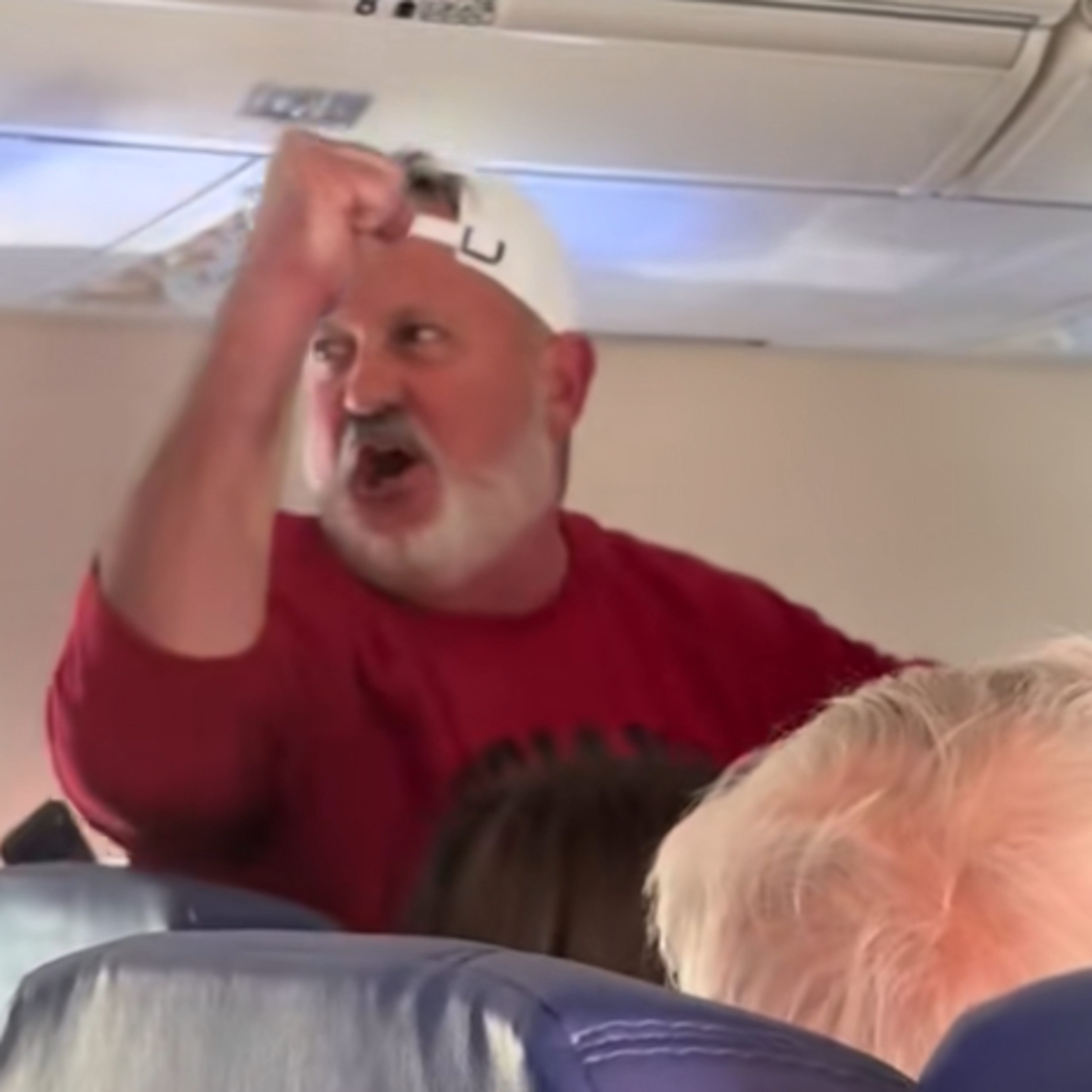 Dad turns flight into college football pep rally before title game ...